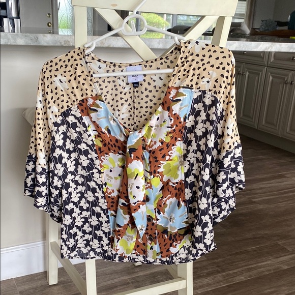 CAbi | Tops | Cabi Cream And Brown Asymmetrical Ruffled Blouse | Poshmark